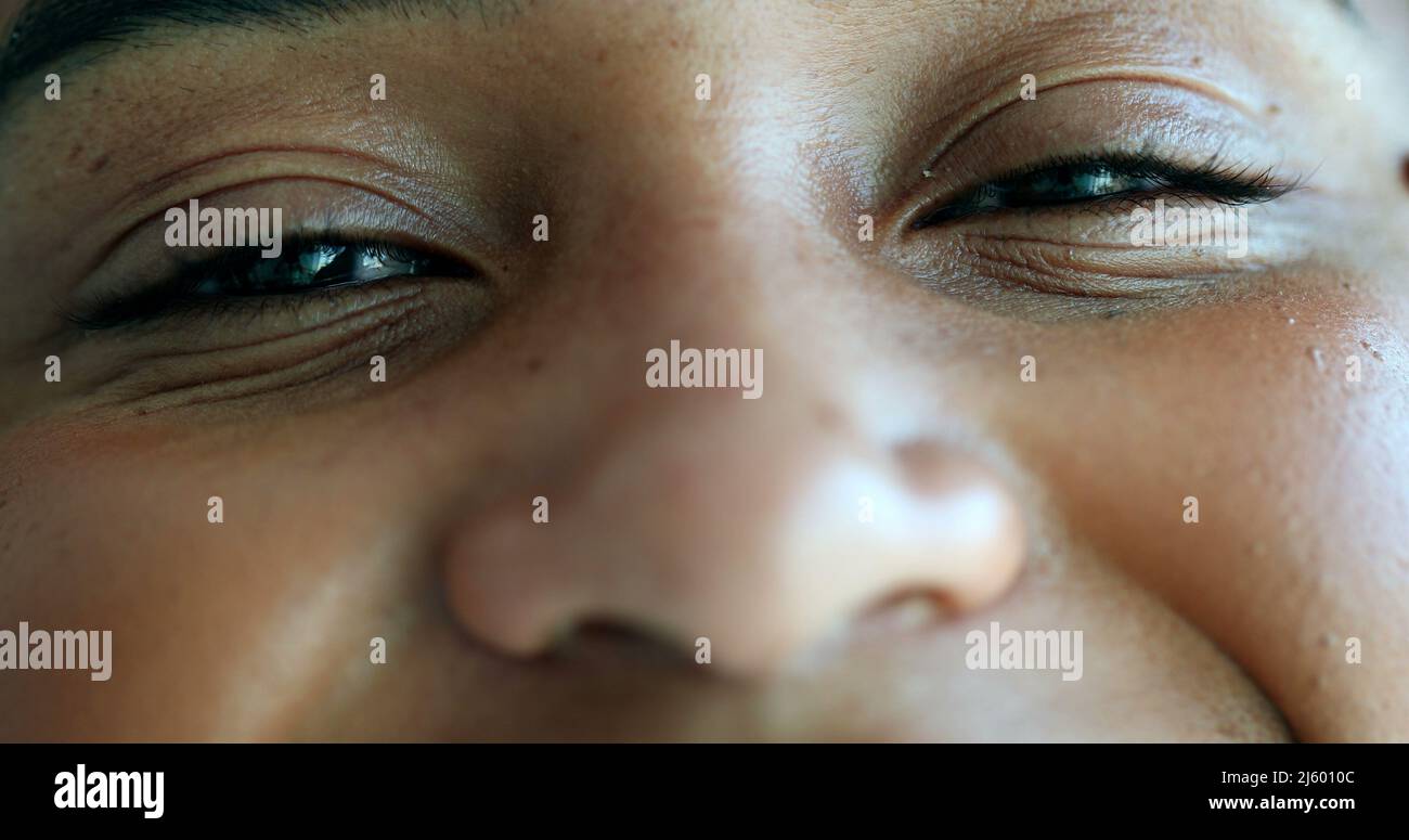 Black person closing eyes in meditation. African woman opening eye ...