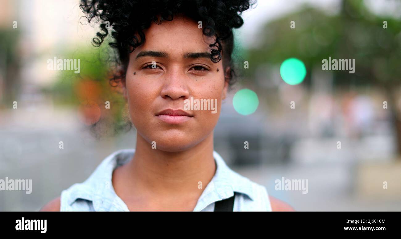 Black woman changing emotion becoming serious. Serious African person ...
