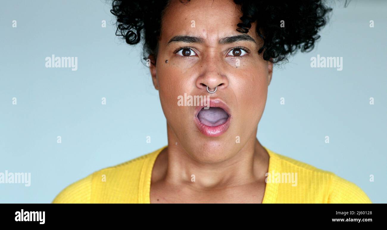Black woman emotional SHOCK disbelief reaction Stock Photo - Alamy