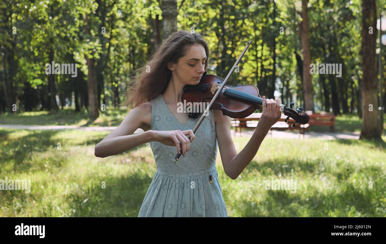 Young female fiddle violin player hi-res stock photography and images ...
