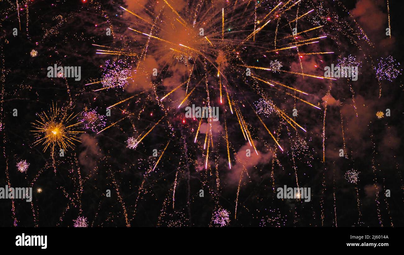 A colourful explosion of fireworks in the night sky Stock Photo - Alamy