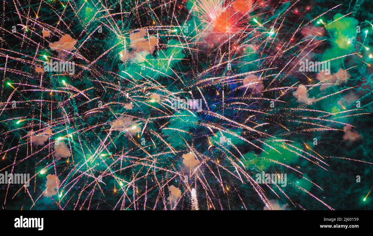 A colourful explosion of fireworks in the night sky Stock Photo - Alamy