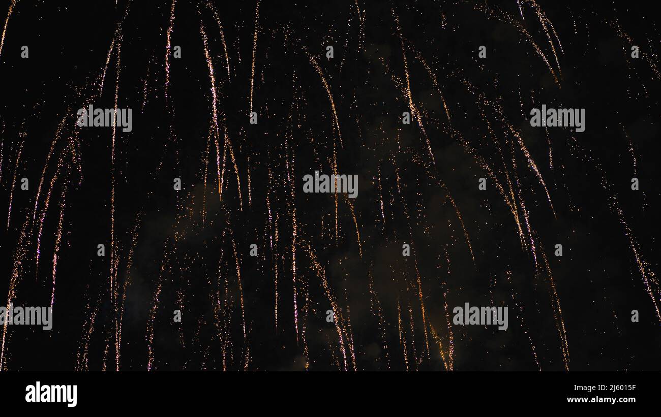 Elements of an explosion of fireworks in the night sky Stock Photo - Alamy