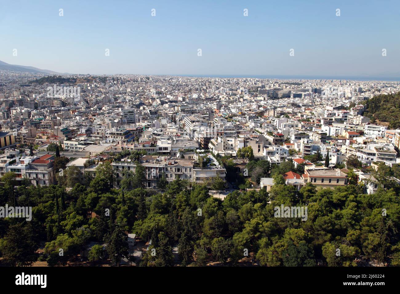 Forest and Athens City view from Acropolis in Greece. Athens is one of ...