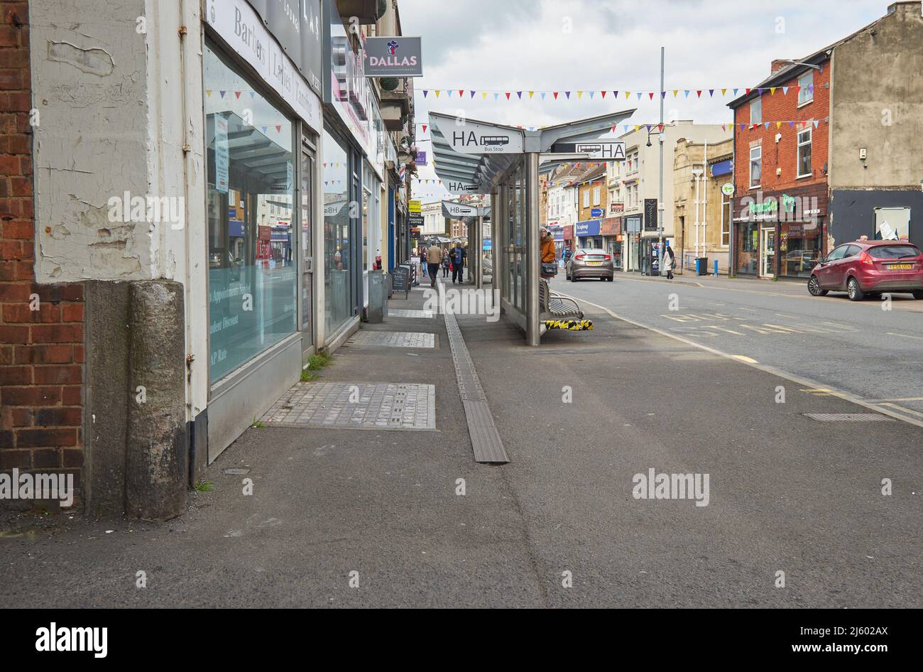 Main road and bus stop in Loughborough, Leicestershire, UK Stock Photo ...