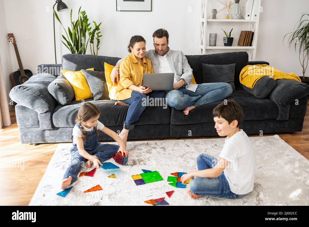 Parents work remotely laptops hi-res stock photography and images - Alamy