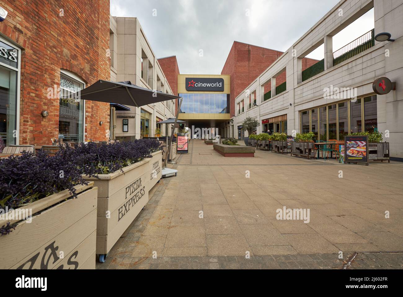 Restaurant and cinema in a town center Stock Photo - Alamy