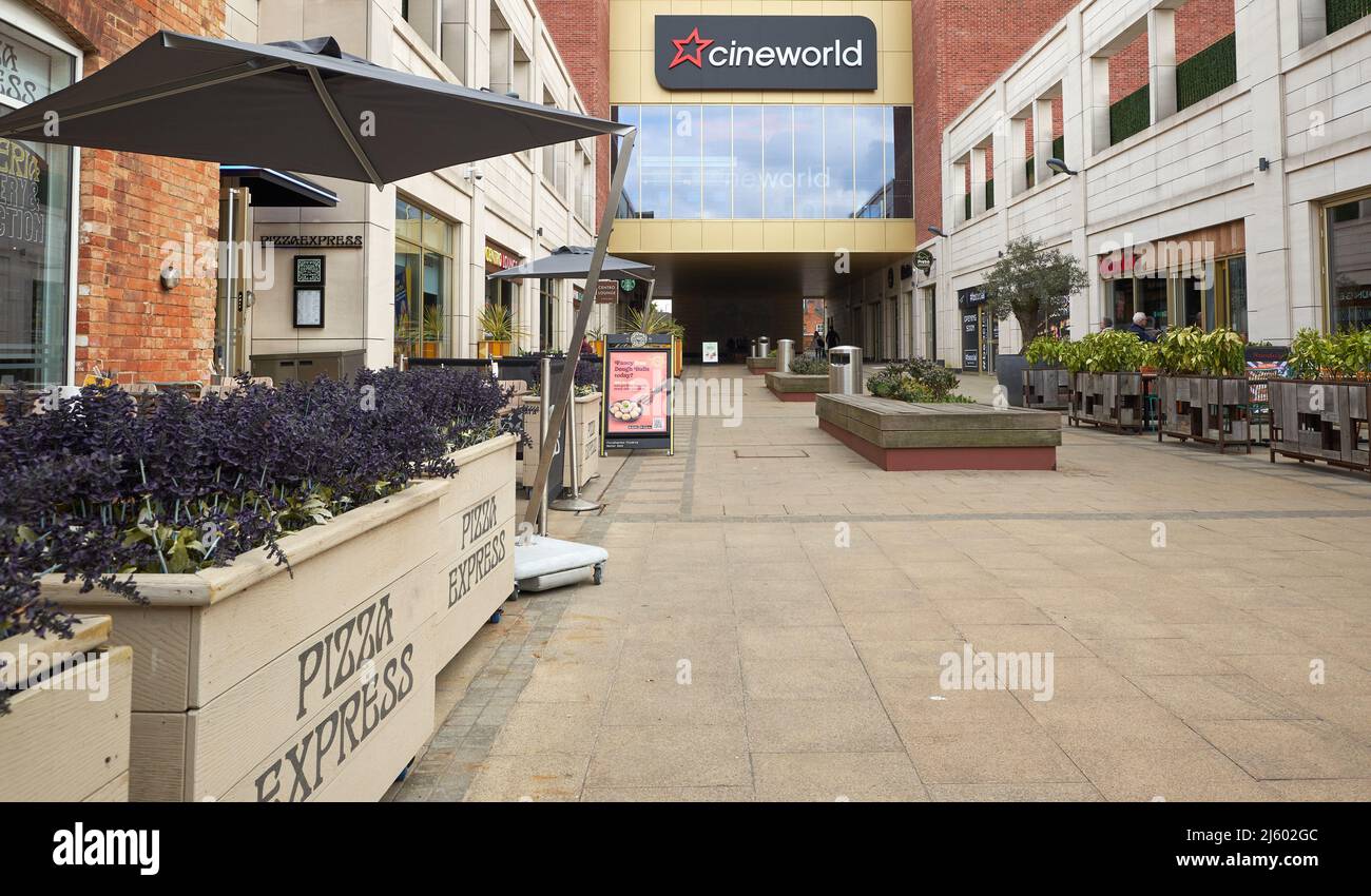 Restaurant and cinema in a town center Stock Photo - Alamy