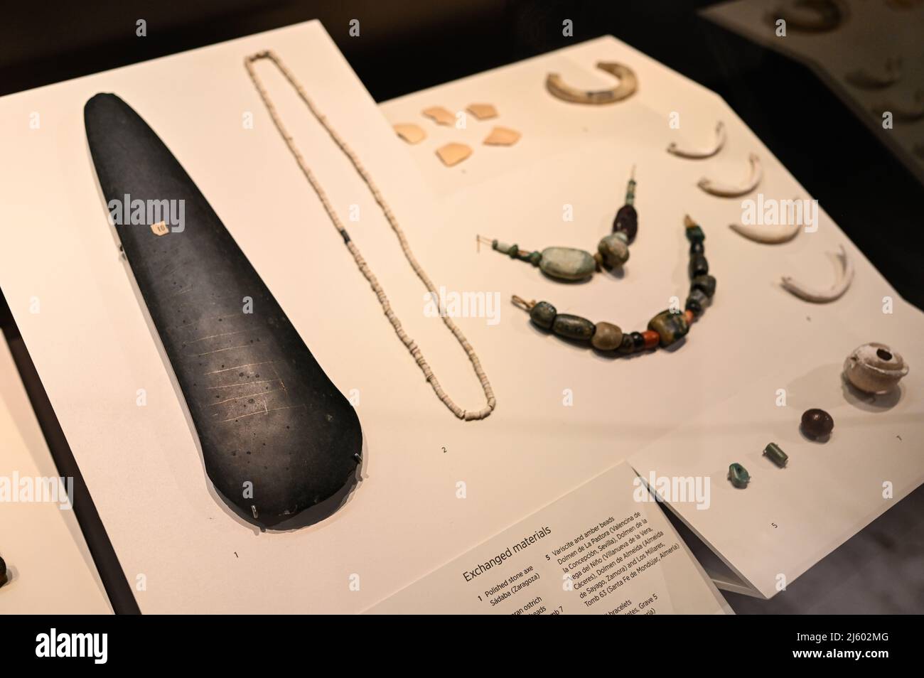 Polished stone axe and Saharan ostrich eggshell beads. The National ...