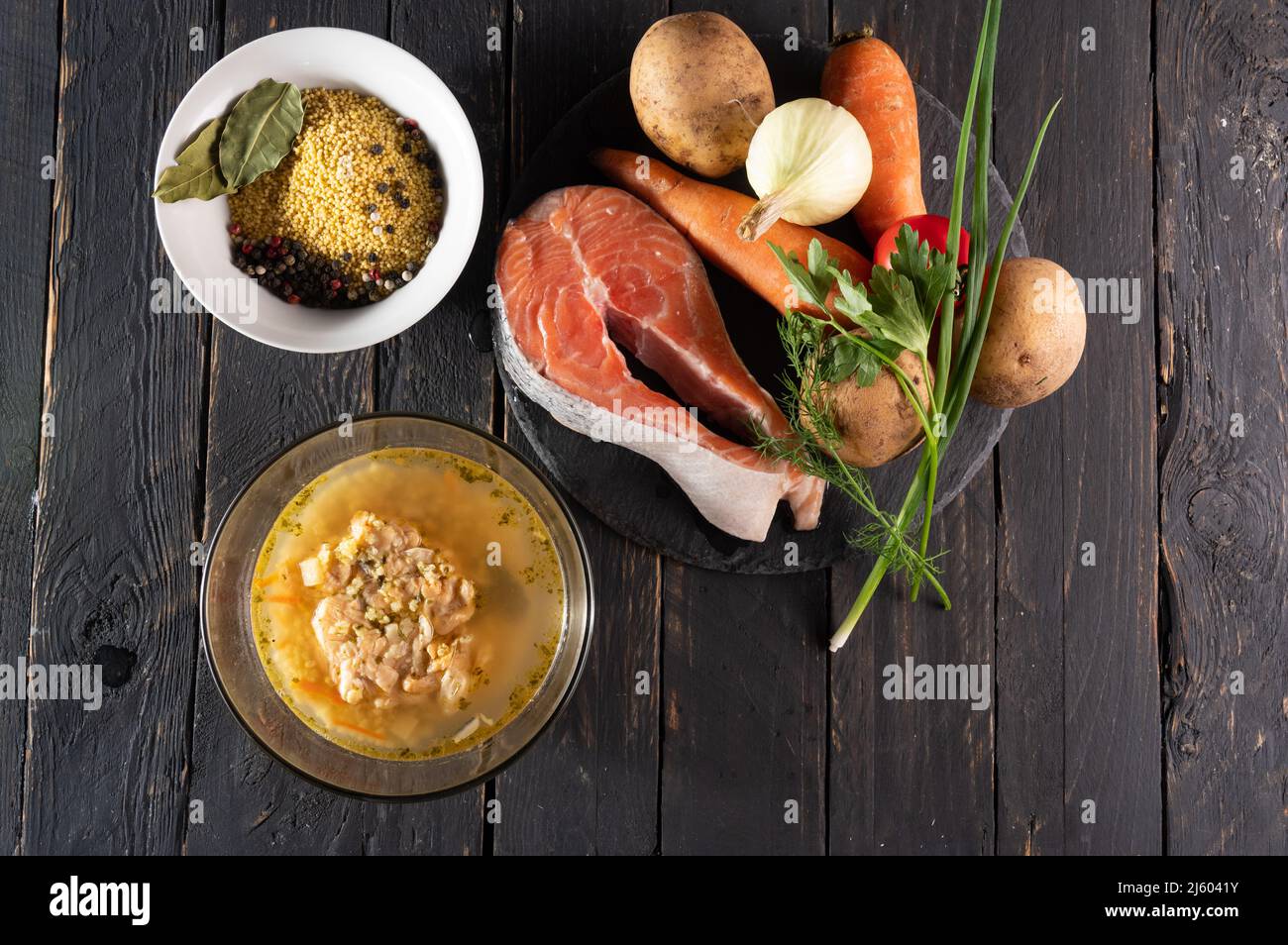 Red fish soup. Vegetables, spices and red fish. Salmon soup. A dish of ...