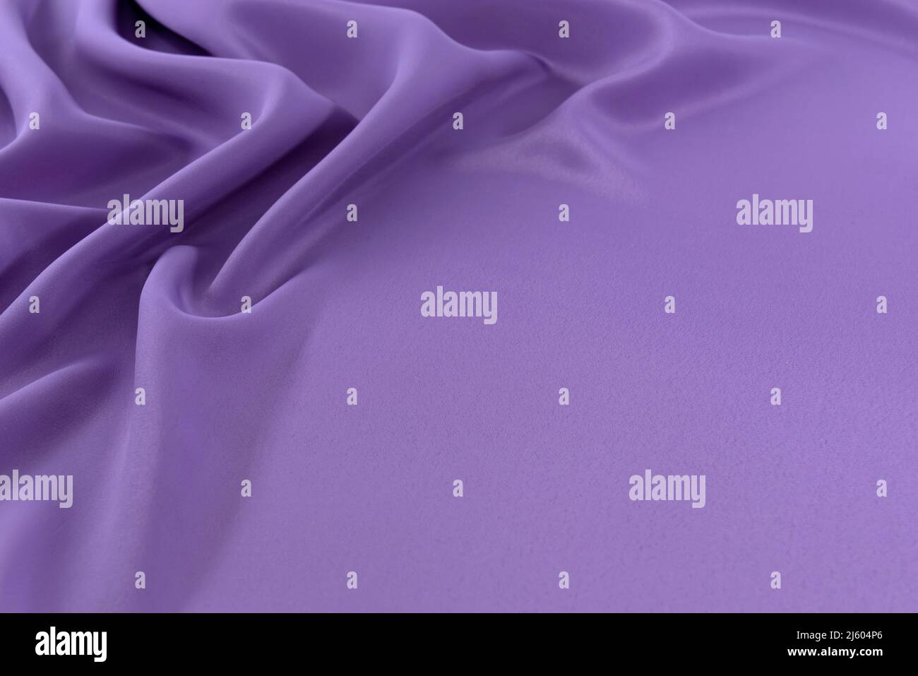 A piece of purple cloth. Fabric texture for background and design works ...