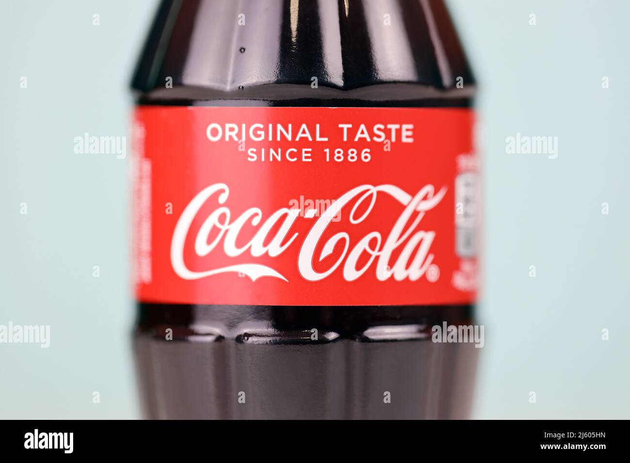 KHARKIV, UKRAINE - DECEMBER 16, 2021: Coca Cola production with classic ...