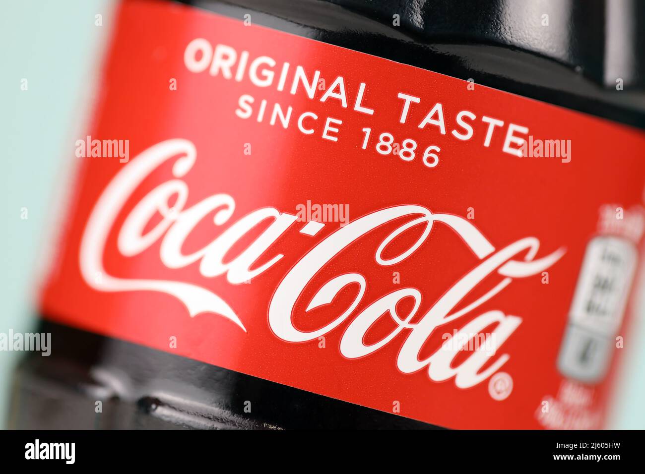 KHARKIV, UKRAINE - DECEMBER 16, 2021: Coca Cola production with classic ...