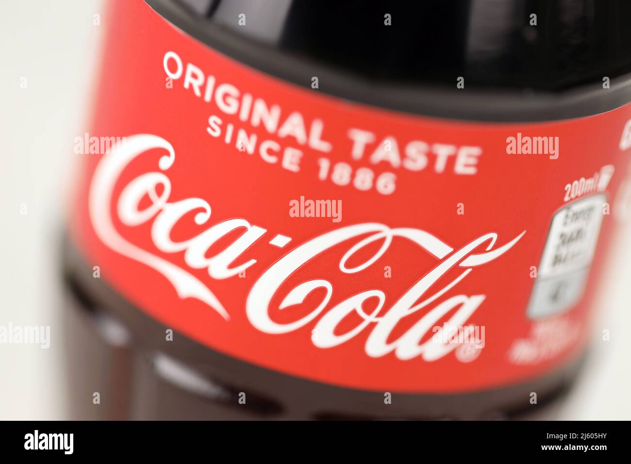 KHARKIV, UKRAINE - DECEMBER 16, 2021: Coca Cola production with classic ...