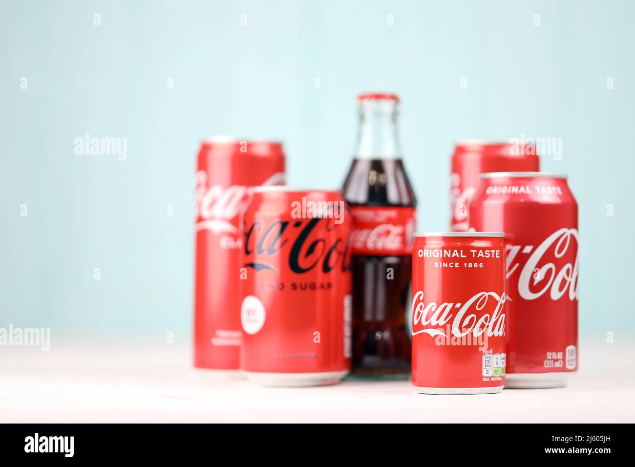 KHARKIV, UKRAINE - DECEMBER 16, 2021: Coca Cola production with classic ...