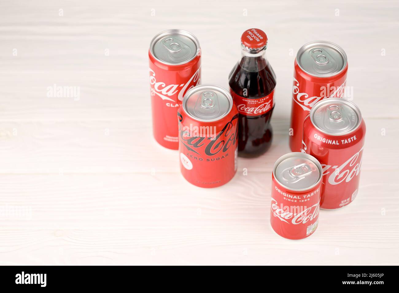 KHARKIV, UKRAINE - DECEMBER 16, 2021: Coca Cola production with classic ...