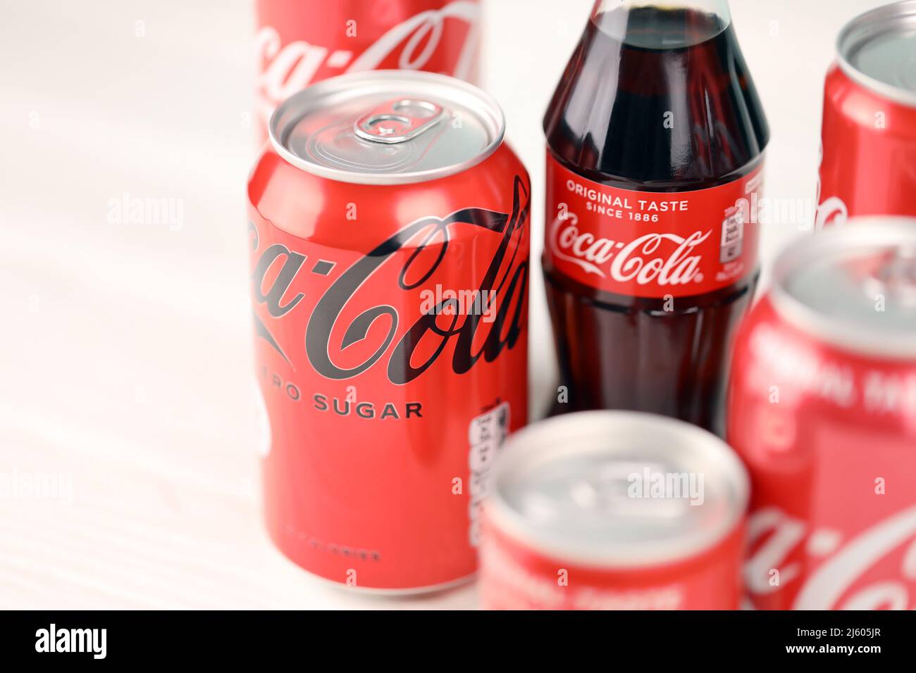 KHARKIV, UKRAINE - DECEMBER 16, 2021: Coca Cola production with classic ...