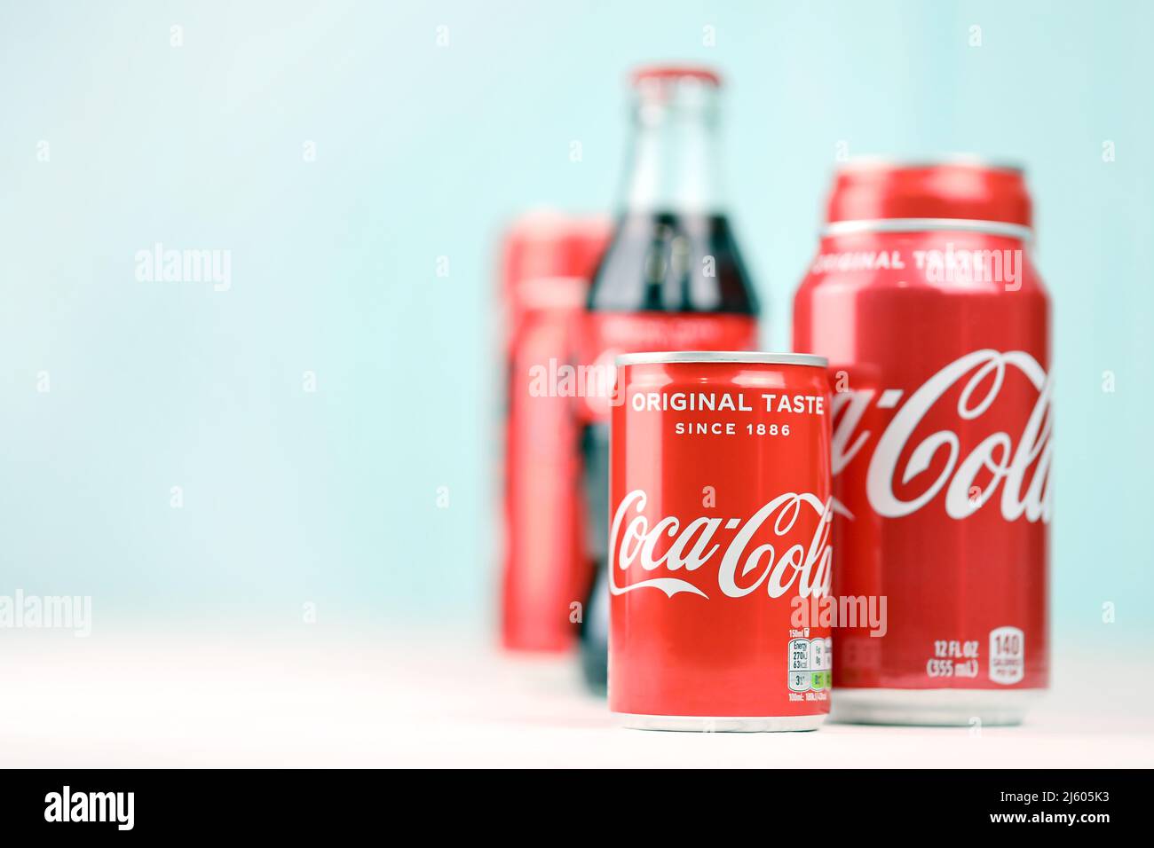 KHARKIV, UKRAINE - DECEMBER 16, 2021: Coca Cola production with classic ...