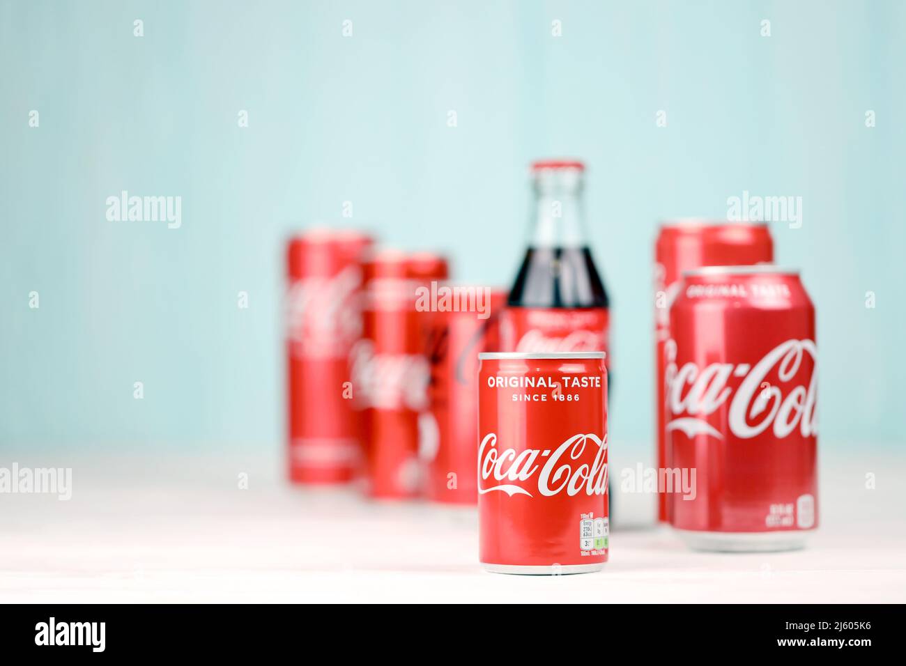 KHARKIV, UKRAINE - DECEMBER 16, 2021: Coca Cola production with classic ...