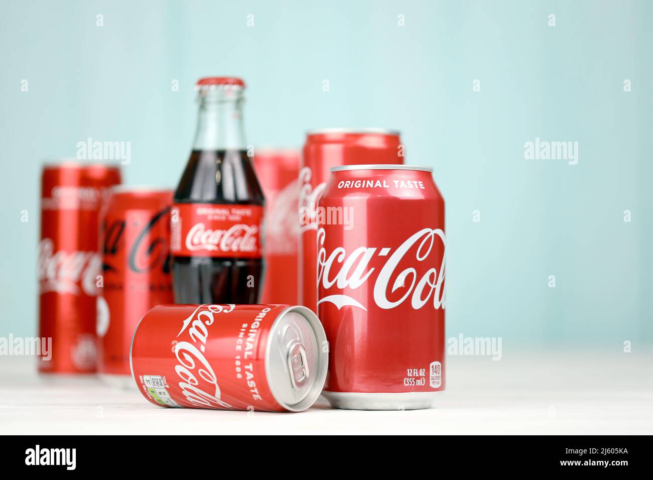 KHARKIV, UKRAINE - DECEMBER 16, 2021: Coca Cola production with classic ...