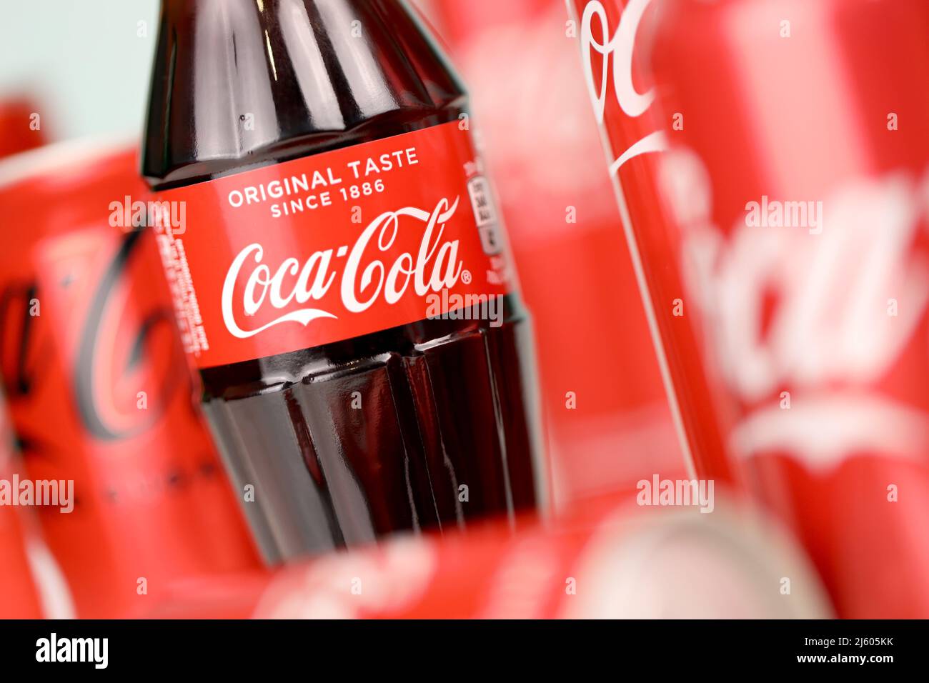 KHARKIV, UKRAINE - DECEMBER 16, 2021: Coca Cola production with classic ...