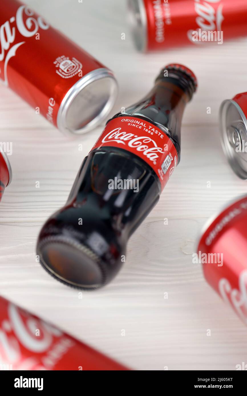 KHARKIV, UKRAINE - DECEMBER 16, 2021: Coca Cola production with classic ...