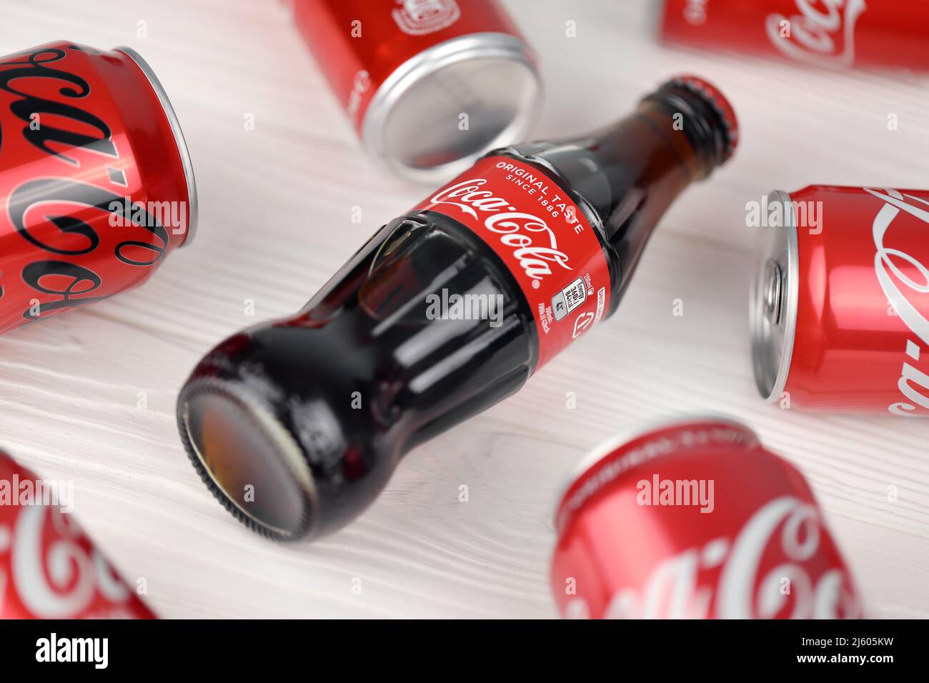 KHARKIV, UKRAINE - DECEMBER 16, 2021: Coca Cola production with classic ...