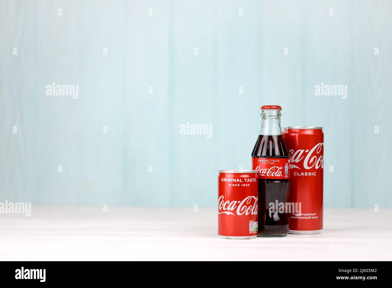 KHARKIV, UKRAINE - DECEMBER 16, 2021: Coca Cola production with classic ...