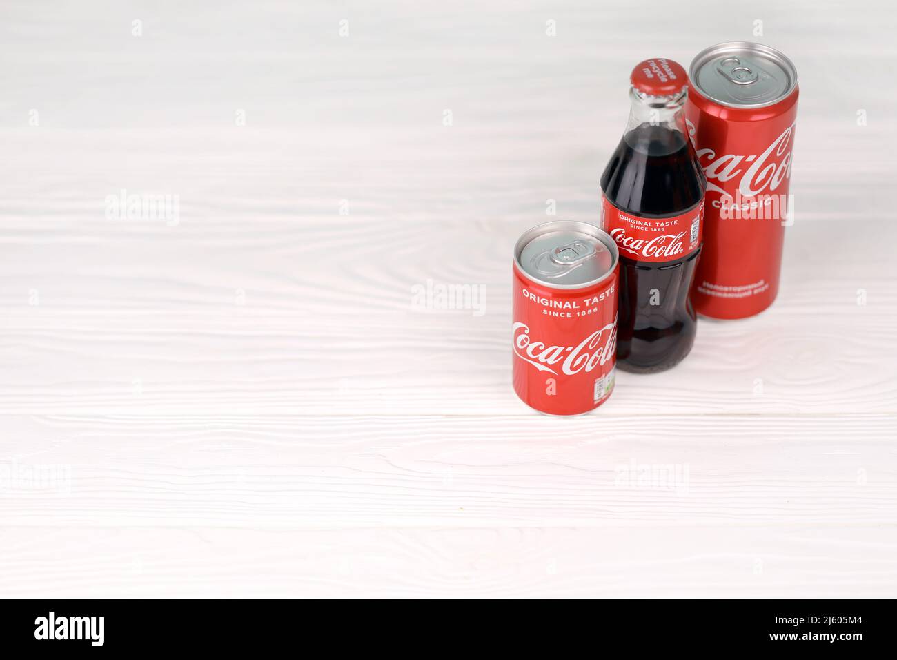 KHARKIV, UKRAINE - DECEMBER 16, 2021: Coca Cola production with classic ...