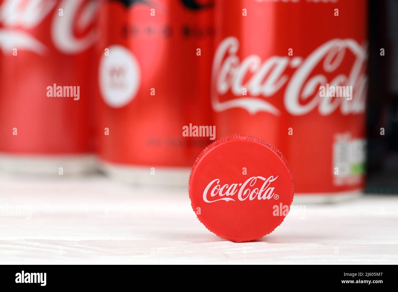 KHARKIV, UKRAINE - DECEMBER 16, 2021: Coca Cola production with classic ...