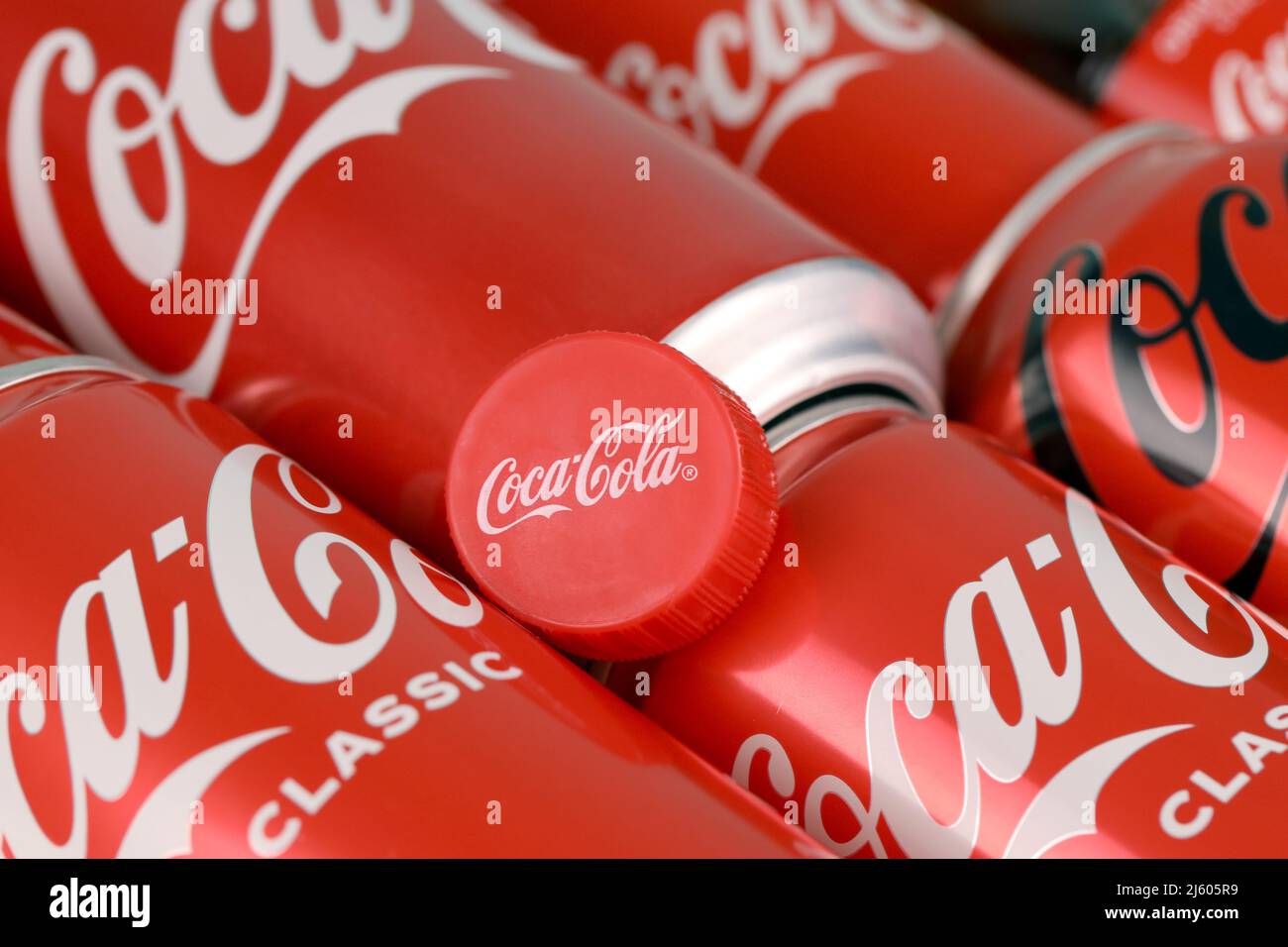 KHARKIV, UKRAINE - DECEMBER 16, 2021: Coca Cola production with classic ...