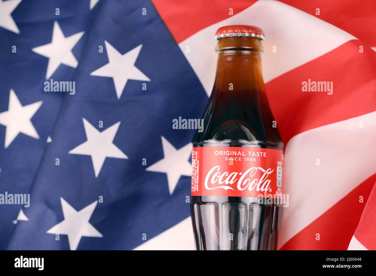 KHARKIV, UKRAINE - DECEMBER 16, 2021: Coca Cola production with classic ...