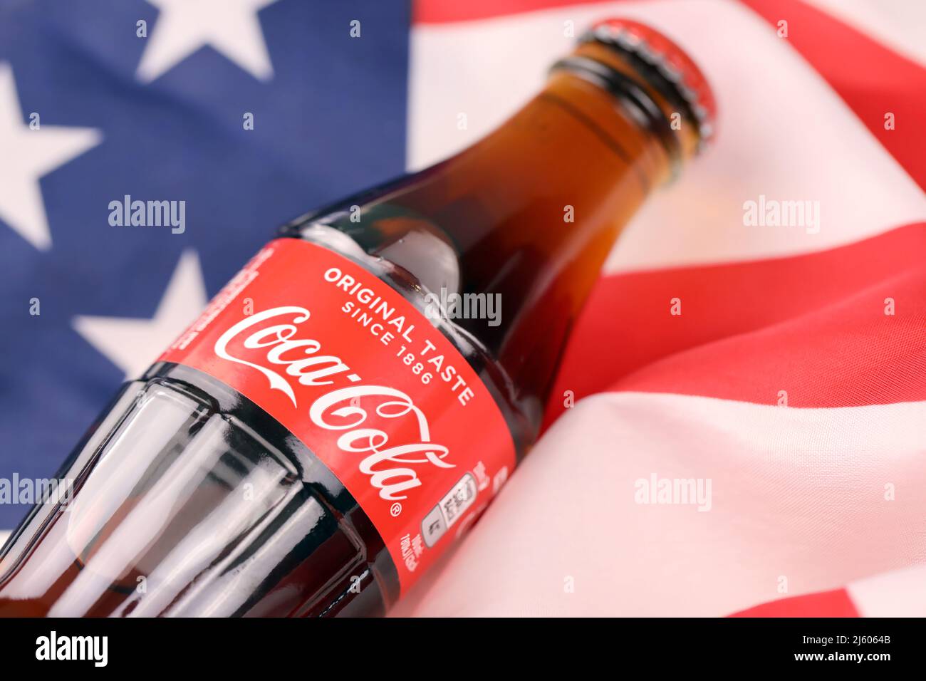 KHARKIV, UKRAINE - DECEMBER 16, 2021: Coca Cola production with classic ...