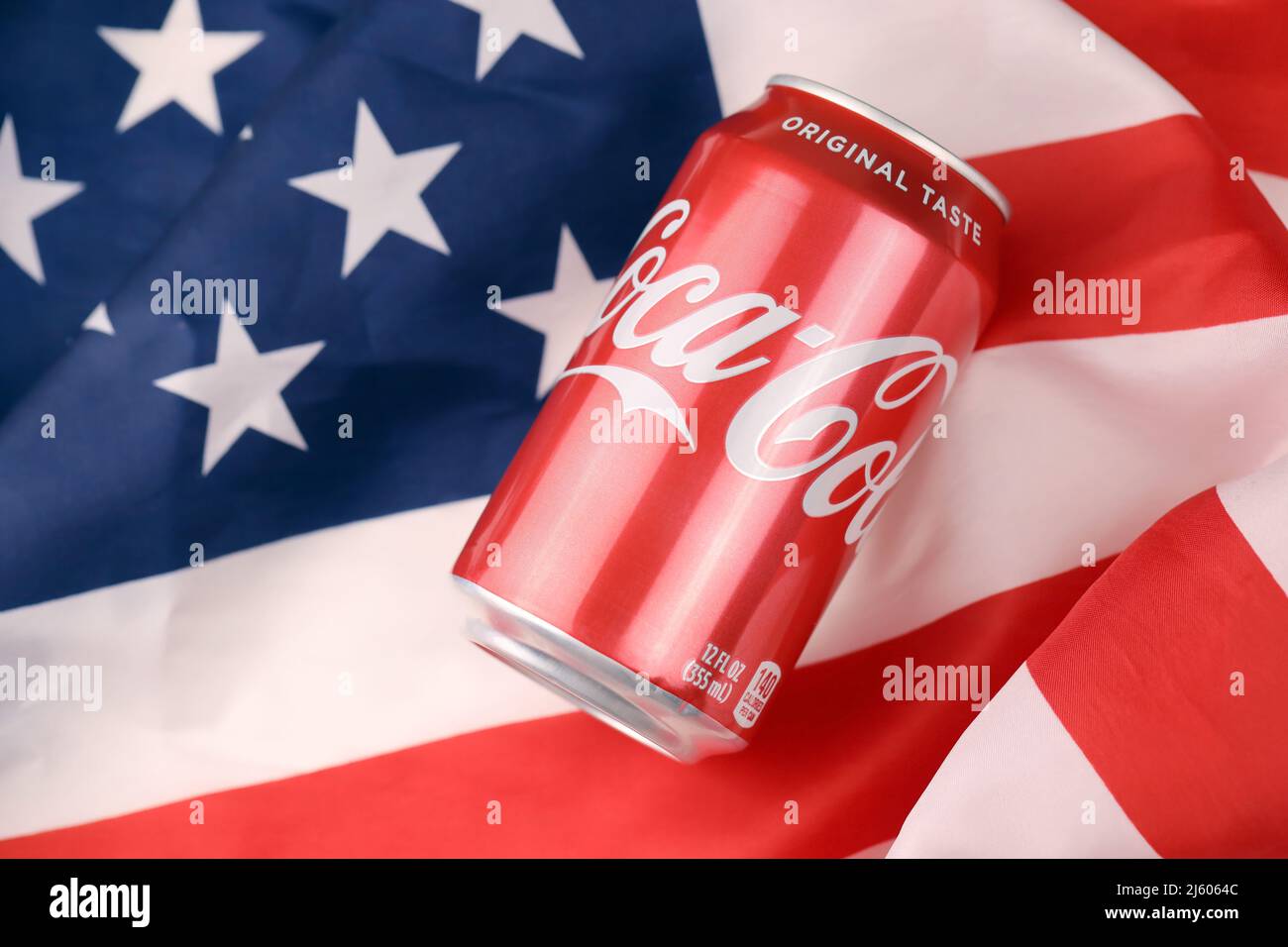 KHARKIV, UKRAINE - DECEMBER 16, 2021: Coca Cola production with classic ...