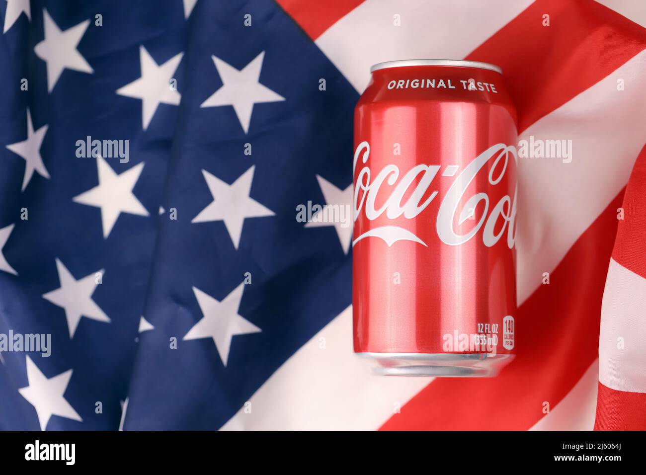 KHARKIV, UKRAINE - DECEMBER 16, 2021: Coca Cola production with classic ...