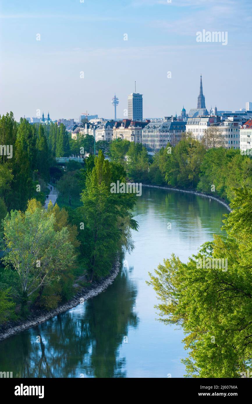 Wien, Vienna: water channel Donaukanal, city center with cathedral ...
