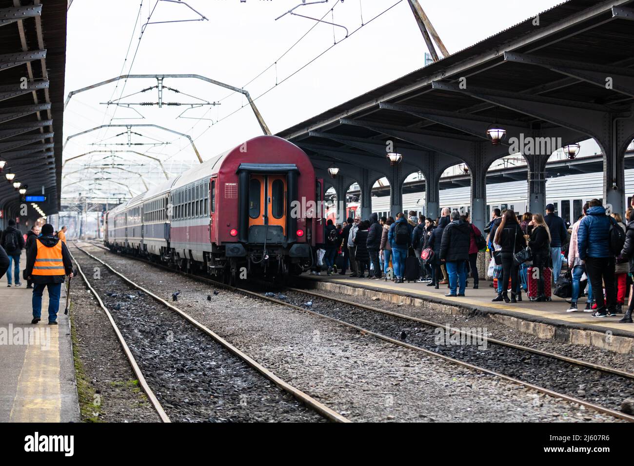 Train in motion or at train platform at Bucharest North Railway Station ...