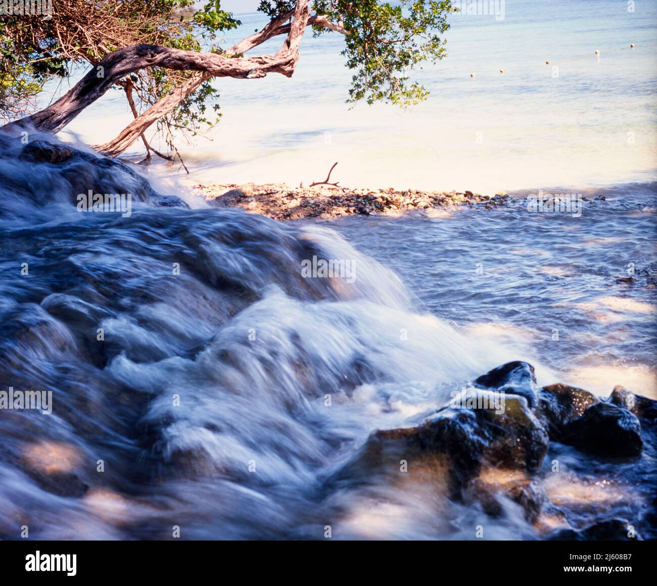 Small waterfall as Dunn's River empties into the Caribbean at Ocho Rios ...