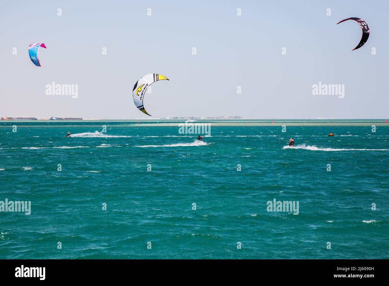 Doha, Qatar-February 14,2016 Kiteboarding on the waters of an ...