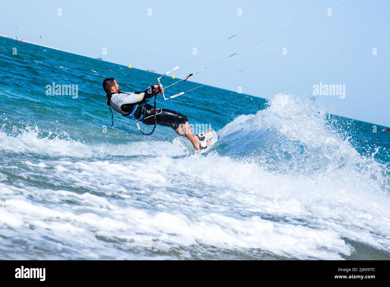 Doha, Qatar-February 14,2016 Kiteboarding on the waters of an ...