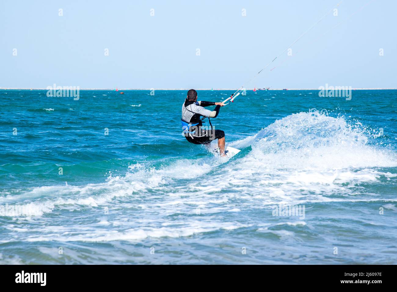 Doha, Qatar-February 14,2016 Kiteboarding on the waters of an ...
