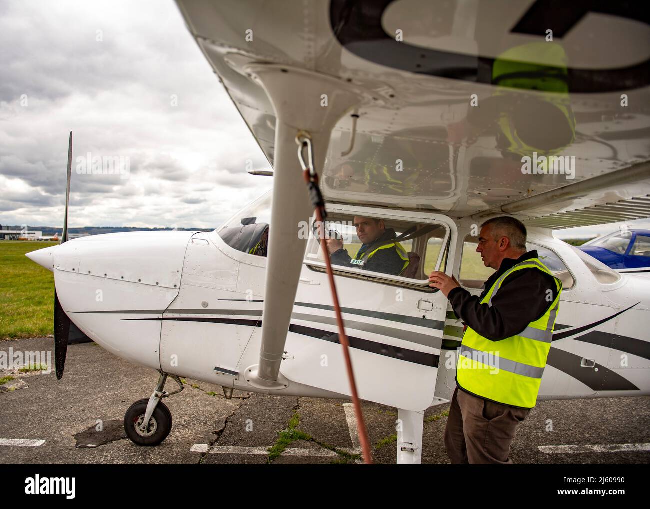 Wide angle of douglas ross piloting a cessna plane hi-res stock ...
