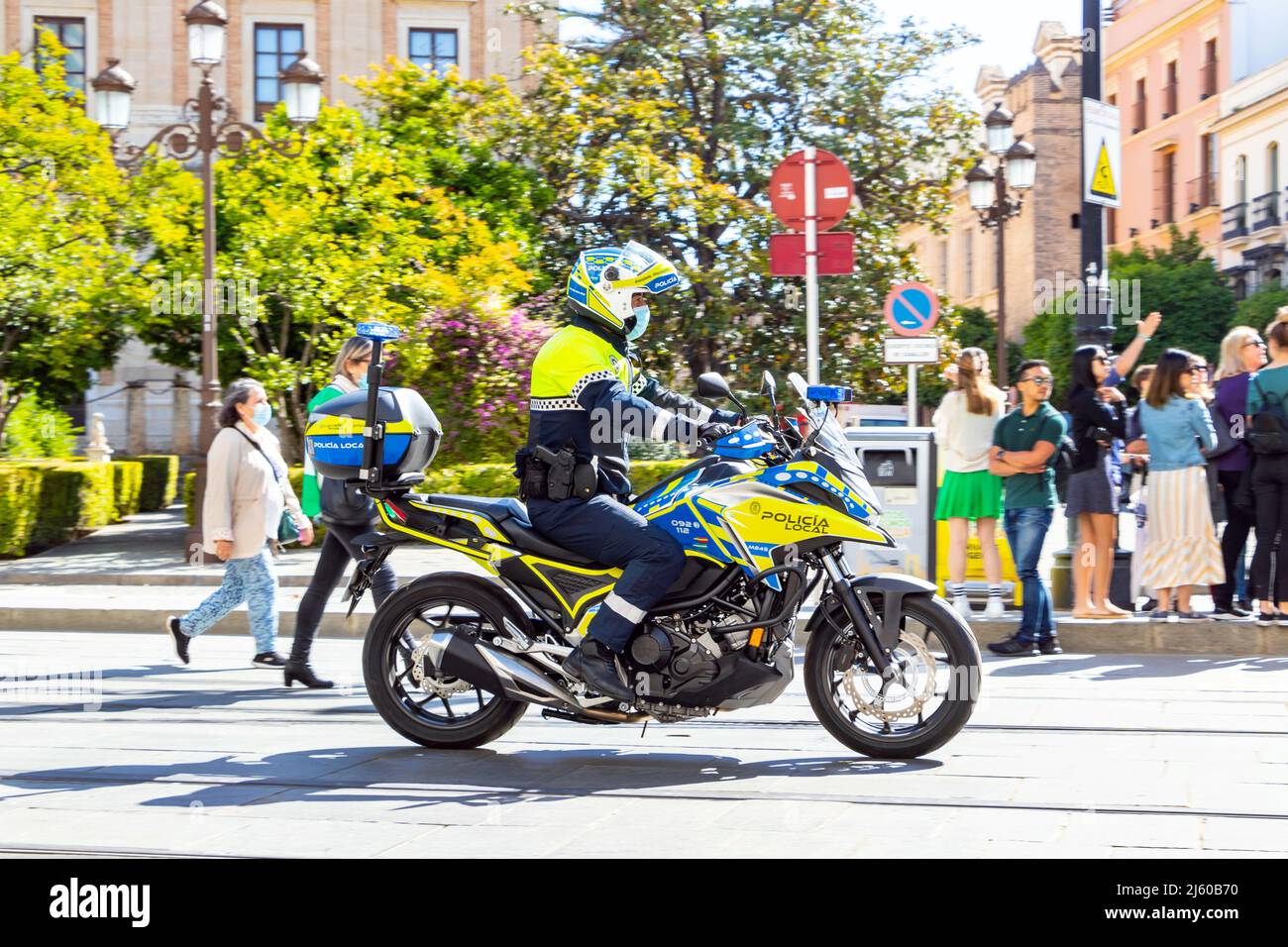 spanish police motorcyclist motorbike and rider in Seville Sevilla ...