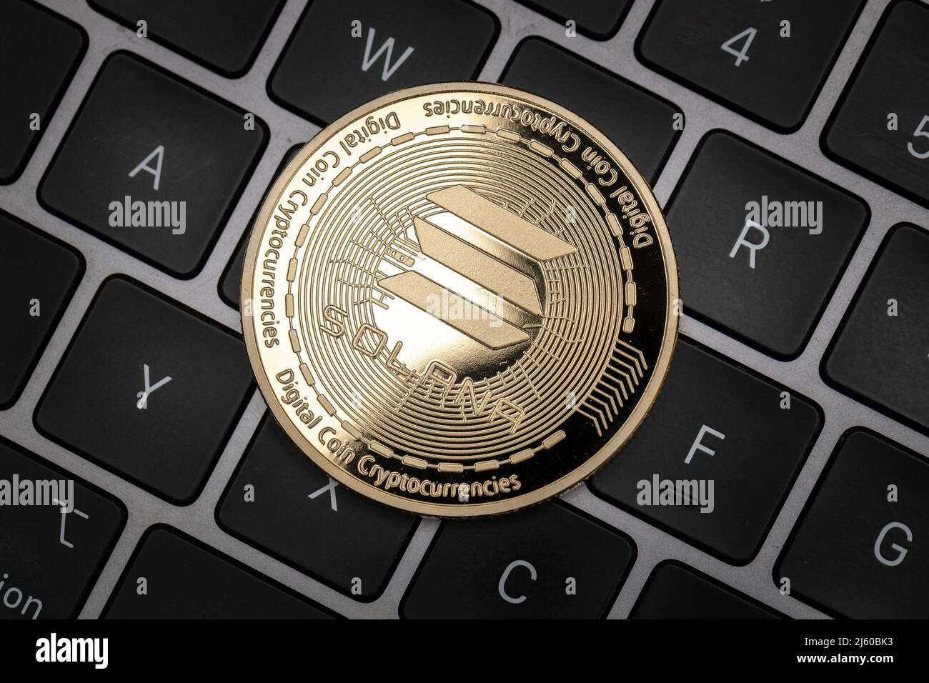 Solana SOL cryptocurrency physical coin on a keyboard Stock Photo - Alamy