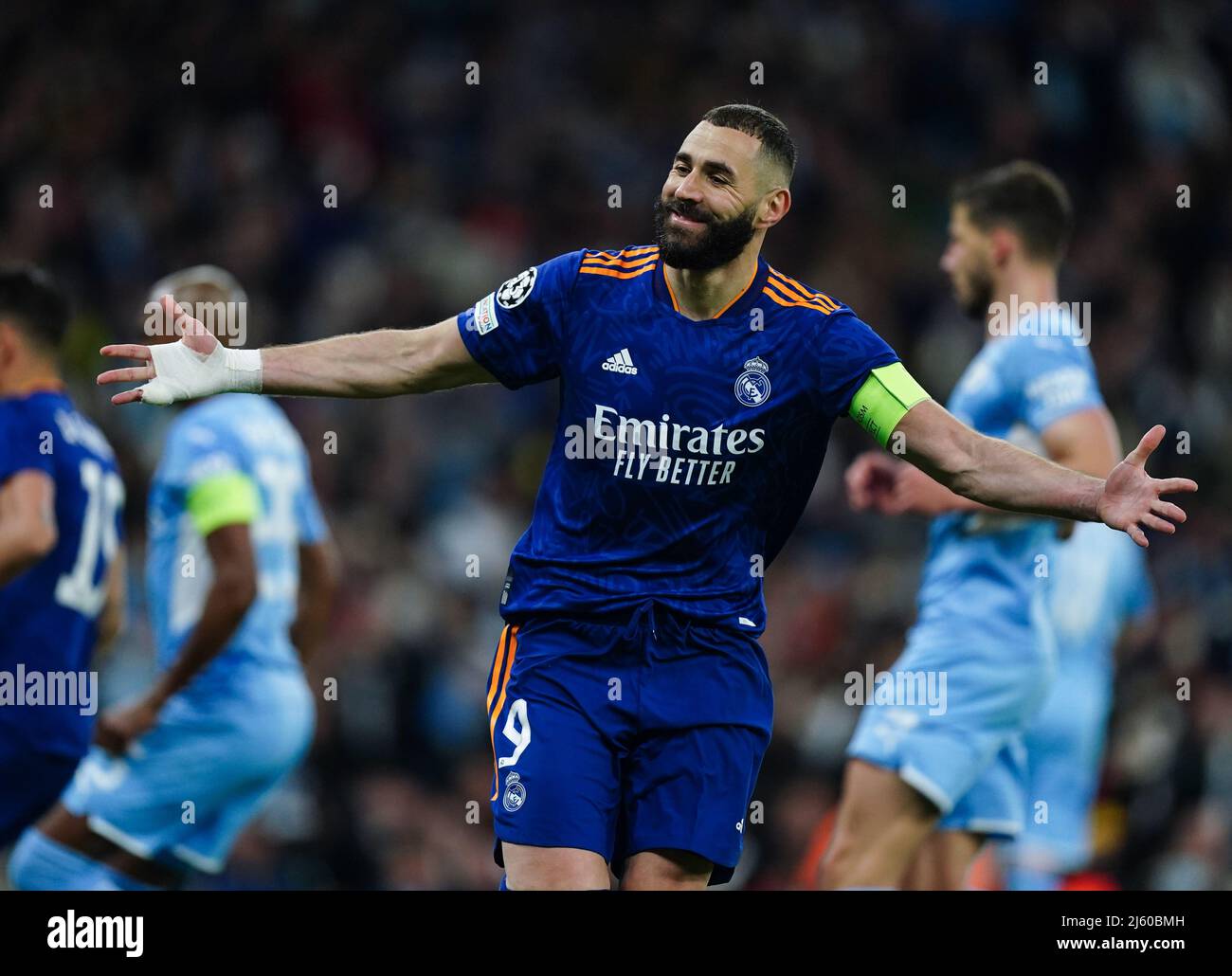 Real Madrid's Karim Benzema celebrates scoring their side's third goal ...