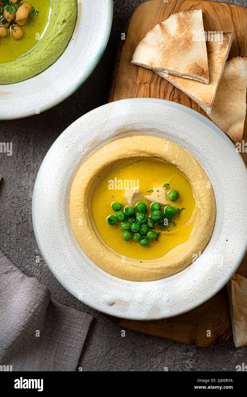 Arabian hummus with pita bread and vegetables, top view Stock Photo - Alamy