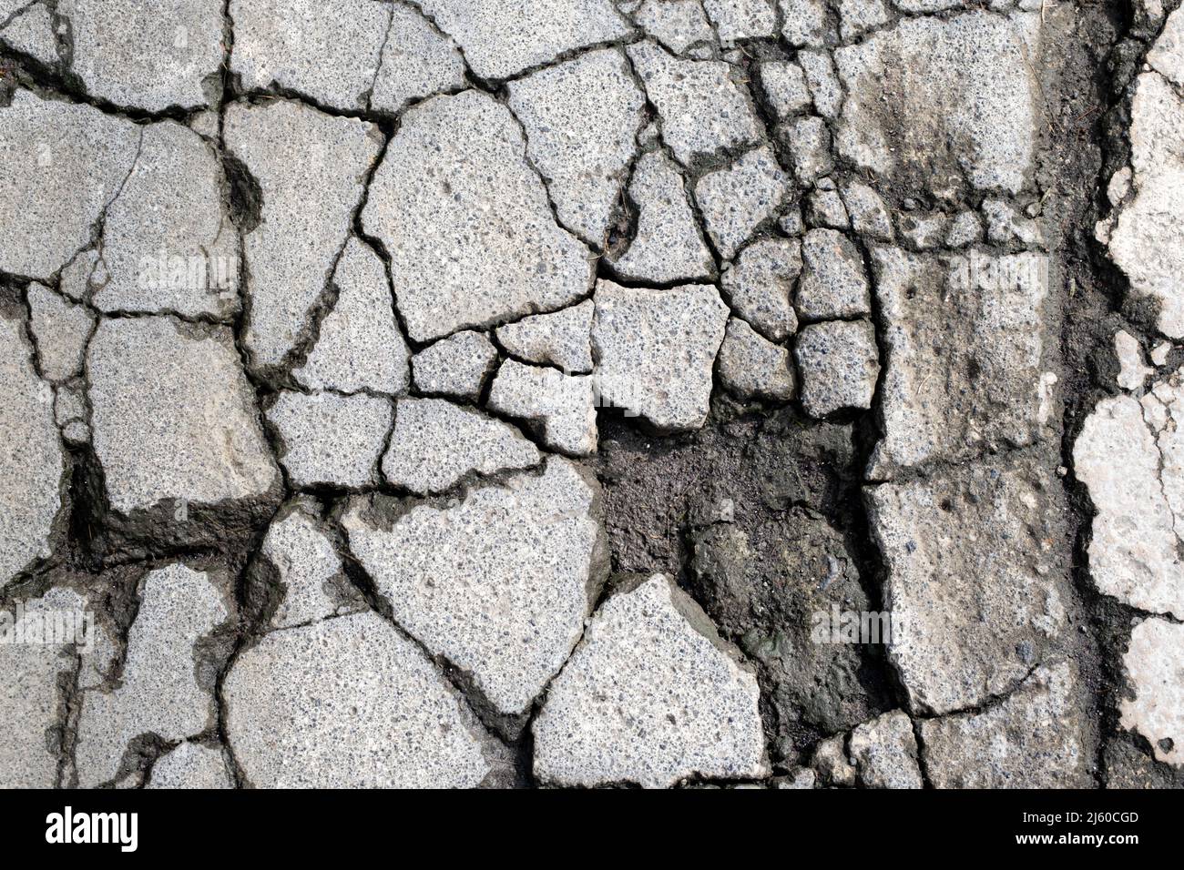 Old White and gray cracked concrete wall with deep crevices Stock Photo ...