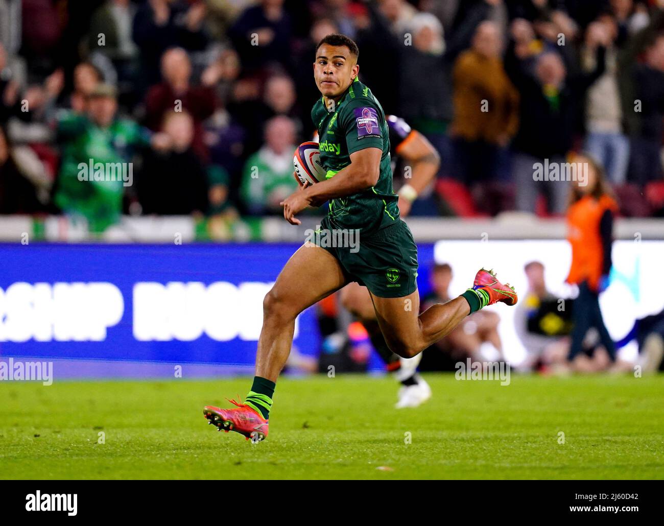 London Irish's Will Joseph on his way to score a try during the ...