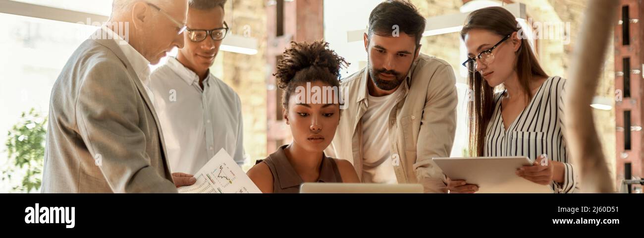 Analyzing results multicultural team hi-res stock photography and ...