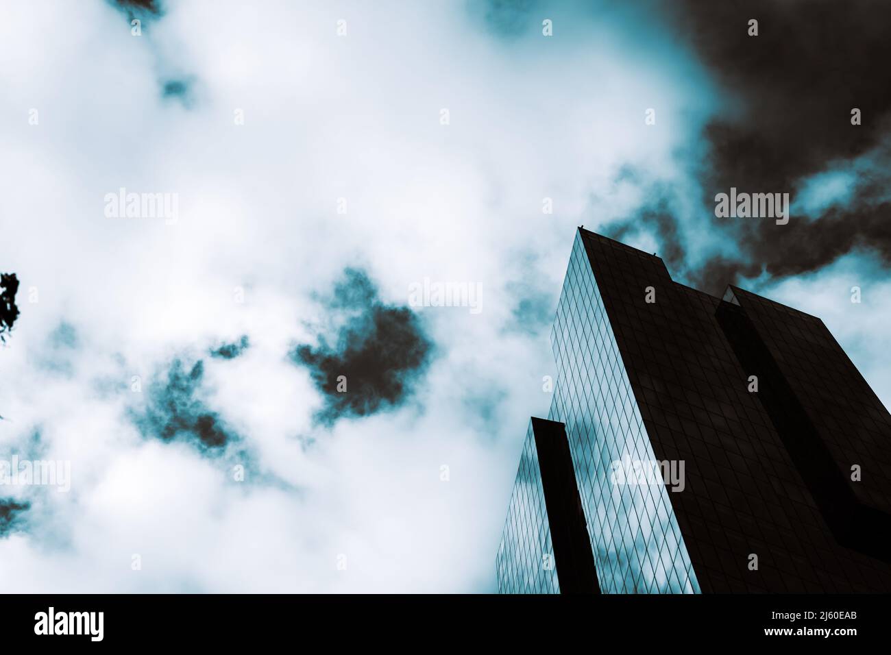 Monochrome modern architecture background photo with cloudy sky ...